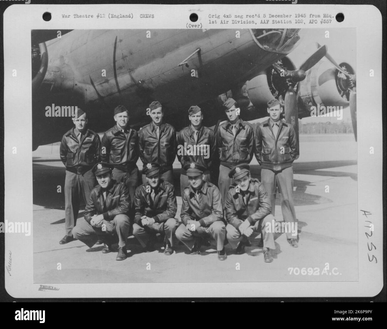 Crew Of A Boeing B-17 "Flying Fortress" Pose Beside Their Plane At An ...