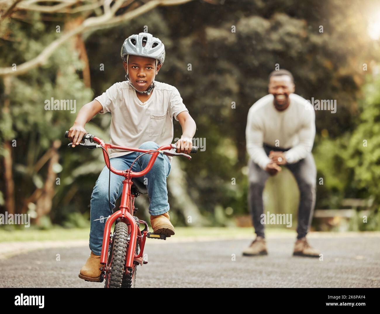 On a steel horse I ride. an adorable boy learning to ride a bicycle ...