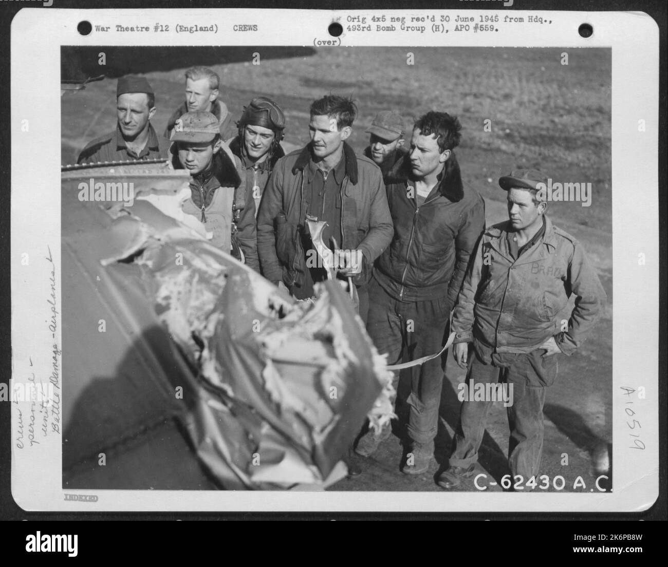 Lt. Craig And Crew Of The 493Rd Bomb Group, 8Th Air Force, Examine ...