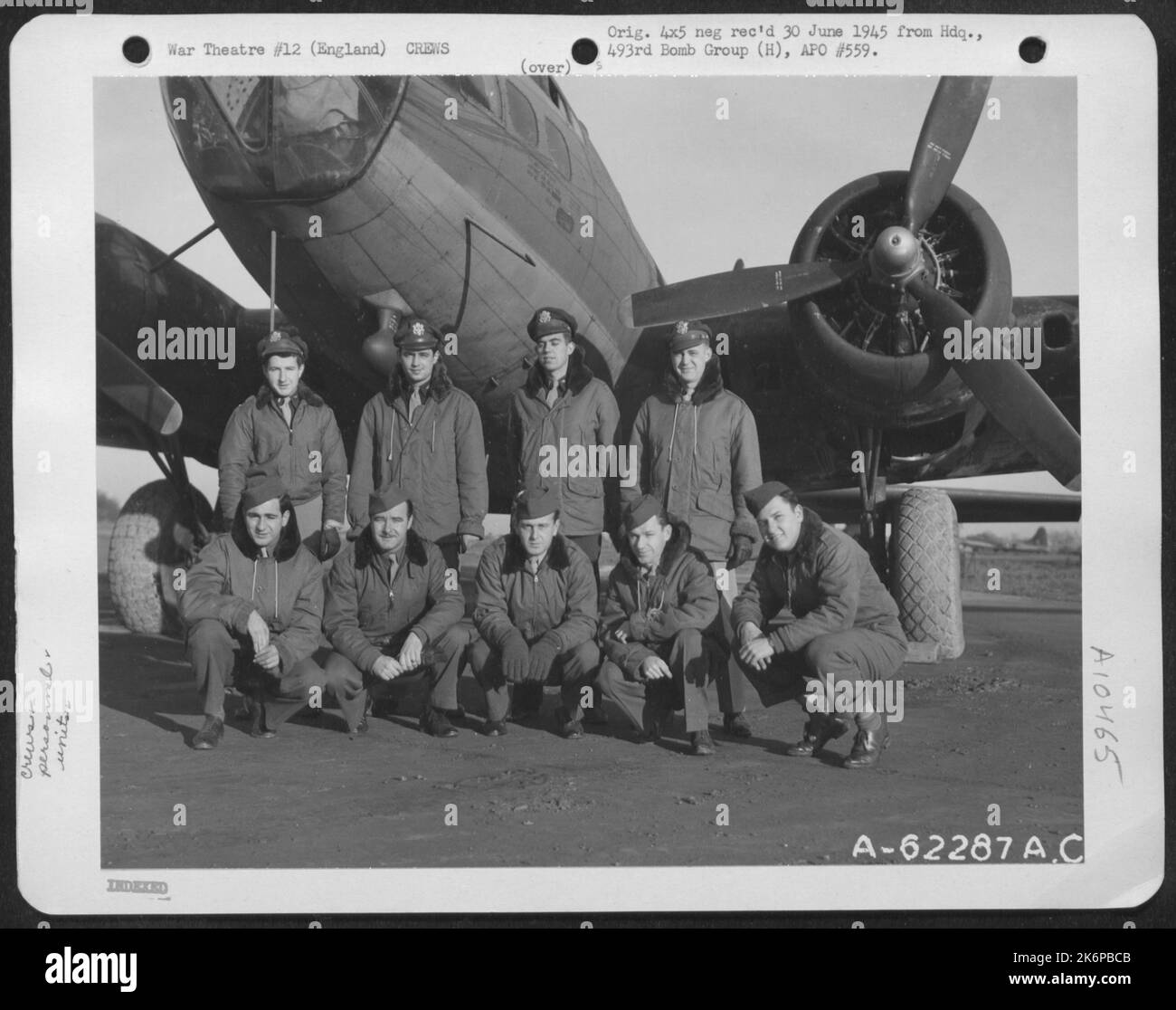 Lt. F. Baker And Crew Of The 493Rd Bomb Group, 8Th Air Force, Beside ...