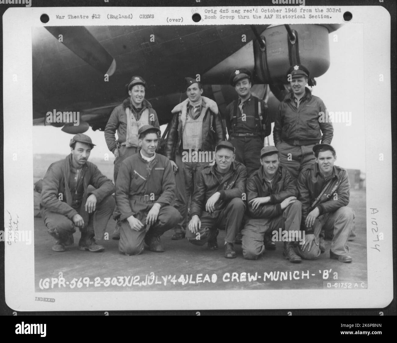Lead Crew On Bombing Mission To Munich, Germany, Beside A Boeing B-17 ...