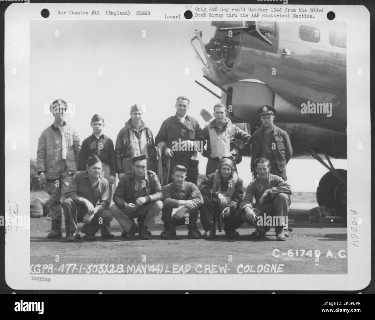Lead Crew On Bombing Mission To Cologne, France, Beside A Boeing B-17 ...