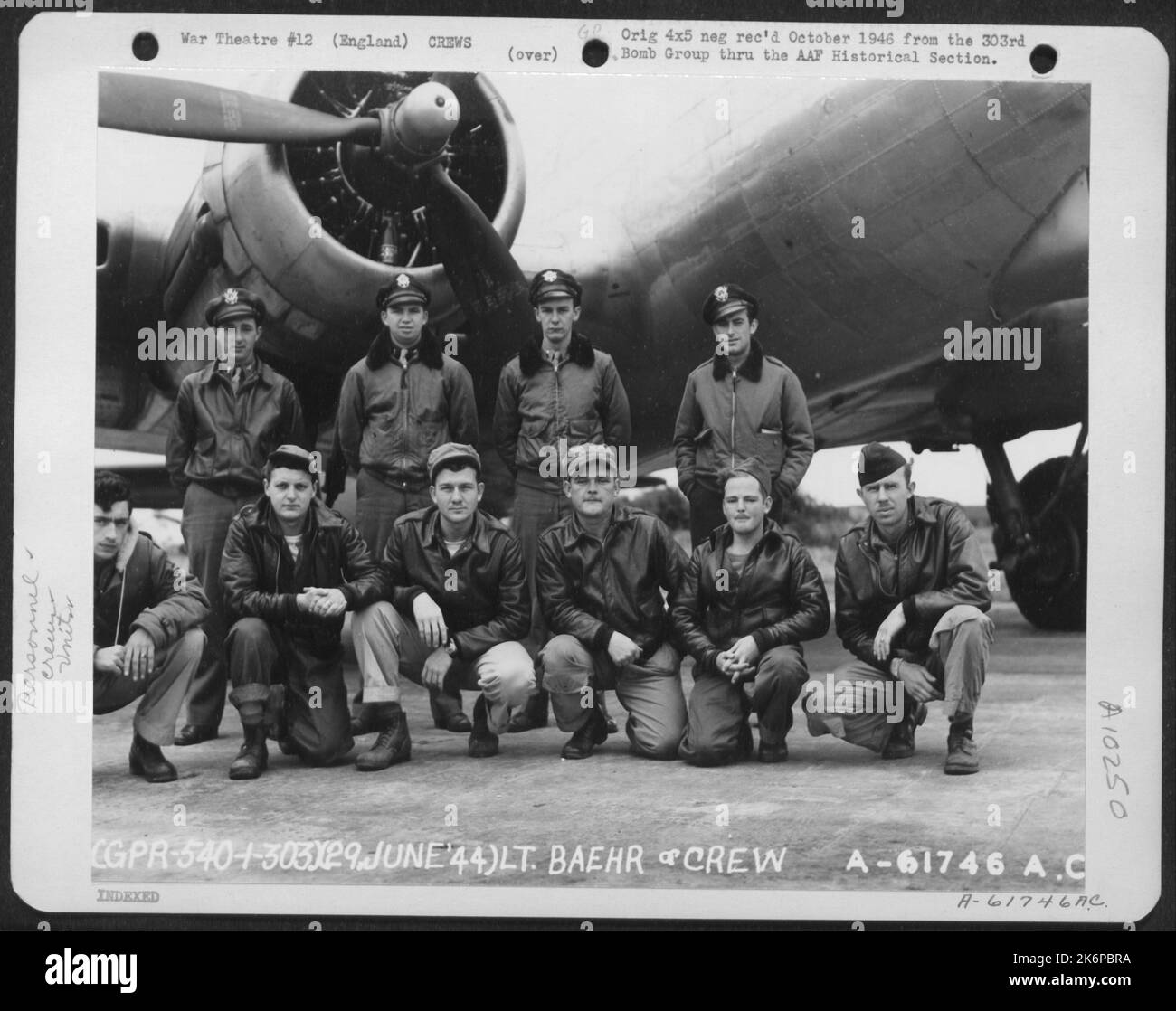 Lt. Kenneth Baher And Crew Of The 303Rd Bomb Group Beside A Boeing B-17 ...
