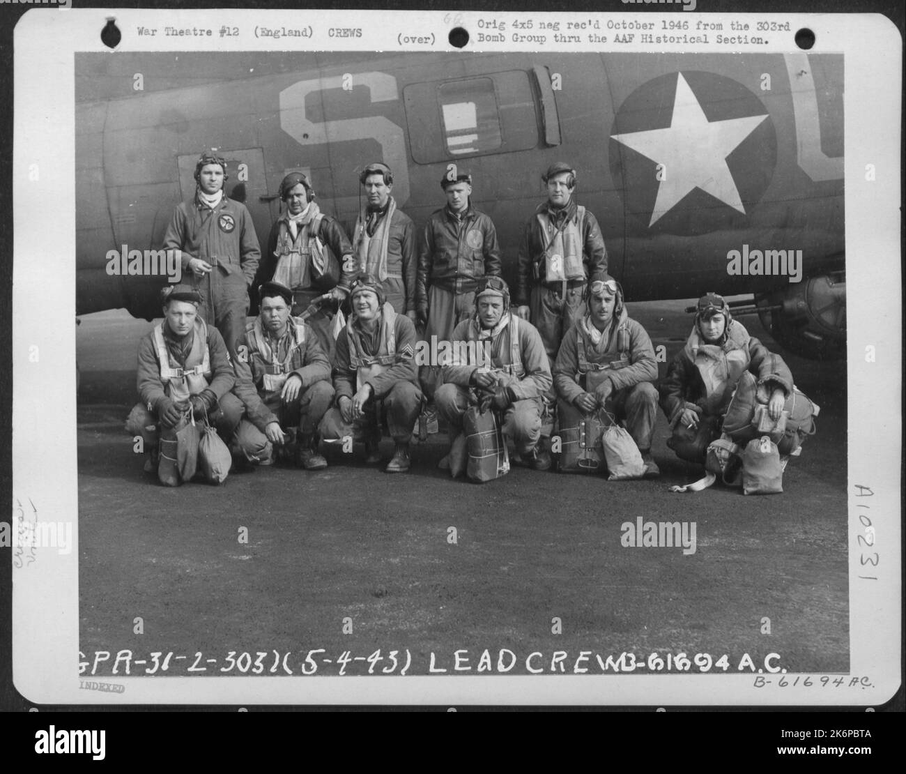 Lead Crew On Bombing Mission Pose Beside A Boeing B-17 Flying Fortress ...