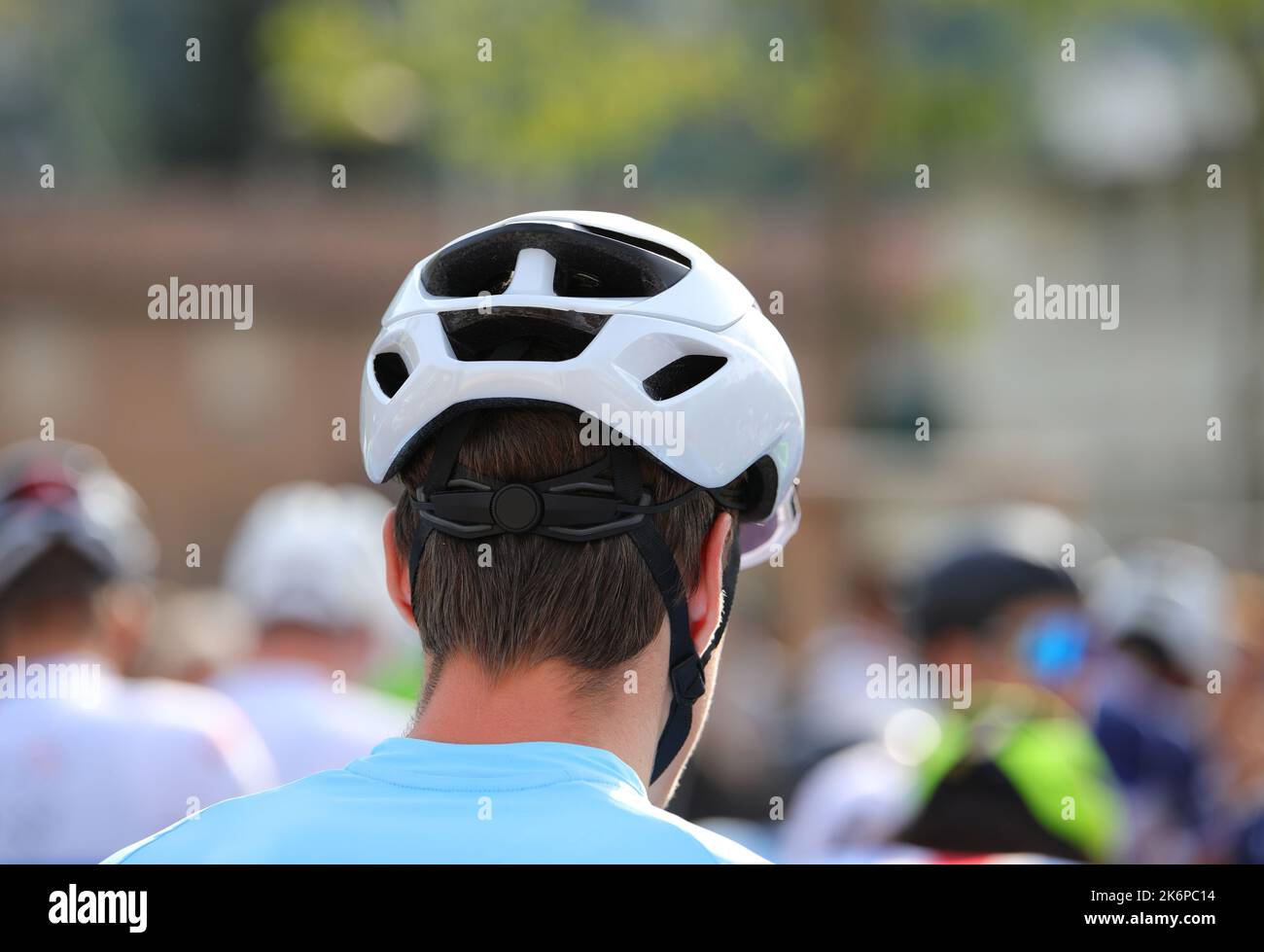 cyclist with his head protected by the helmet before the cycling race ...