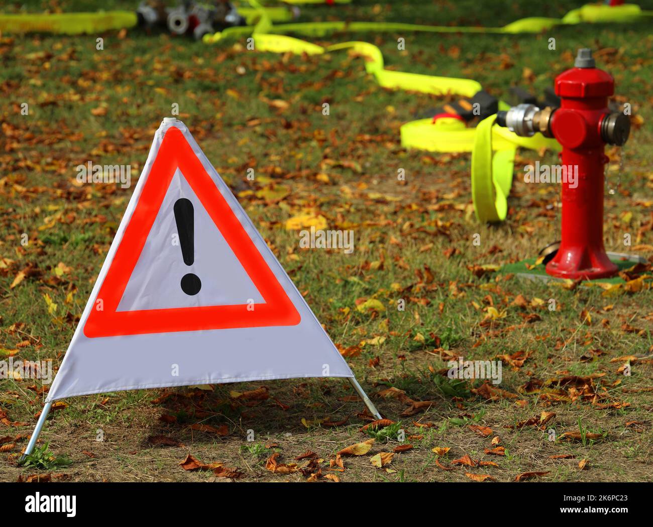 triangle with large exclamation mark and a red fire hydrant Stock Photo ...