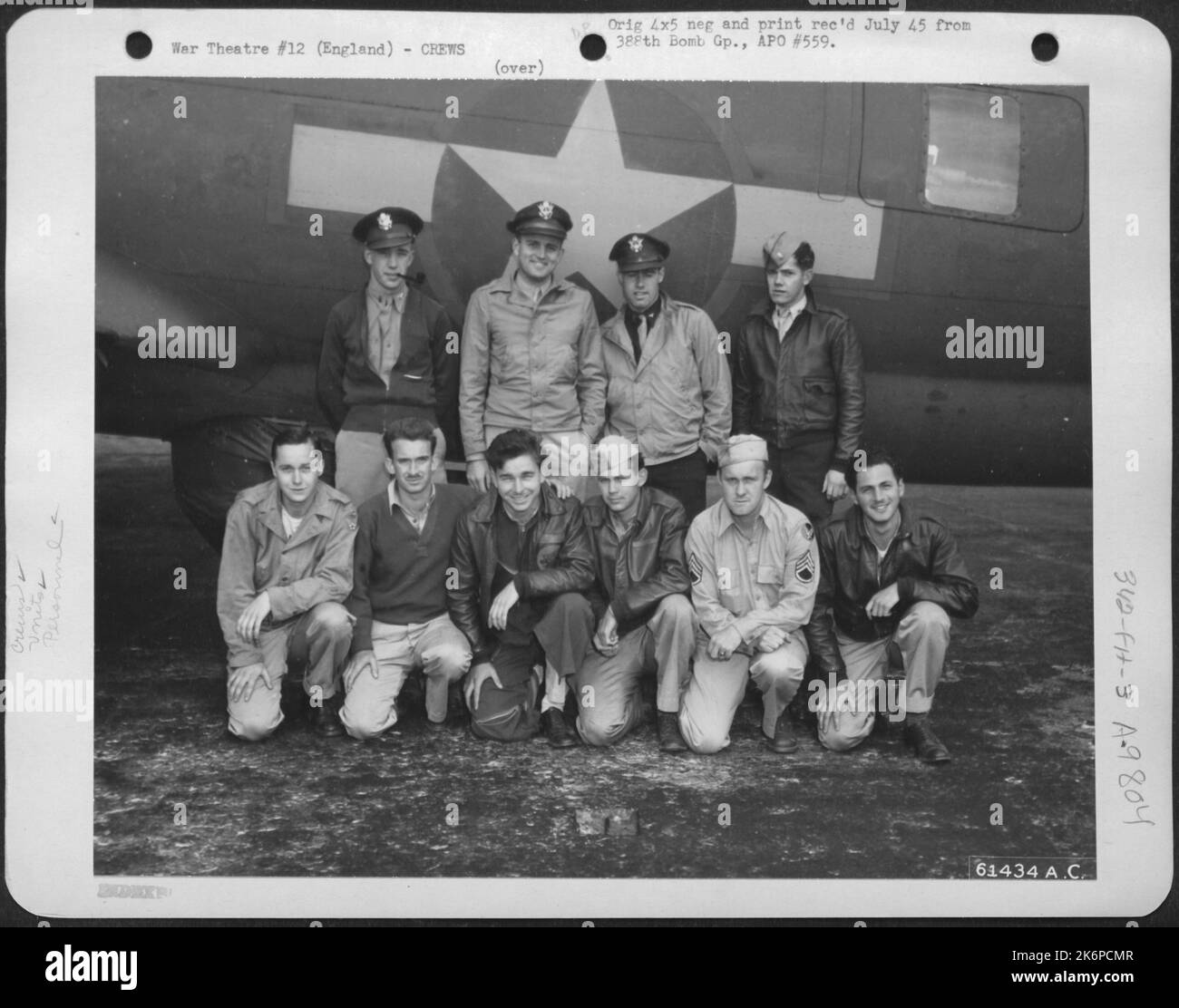 Crew Of The 561St Bomb Sqdn, 388Th Bomb Group, Beside A Boeing B-17 ...