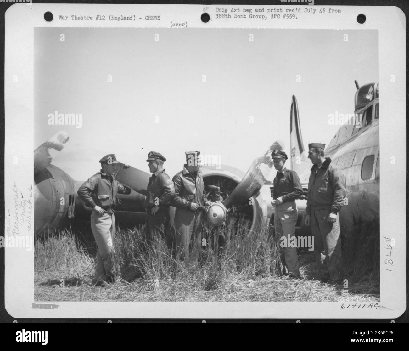 Crew Members Of The 560Th Bomb Squadron, 388Th Bomb Group, Beside A ...