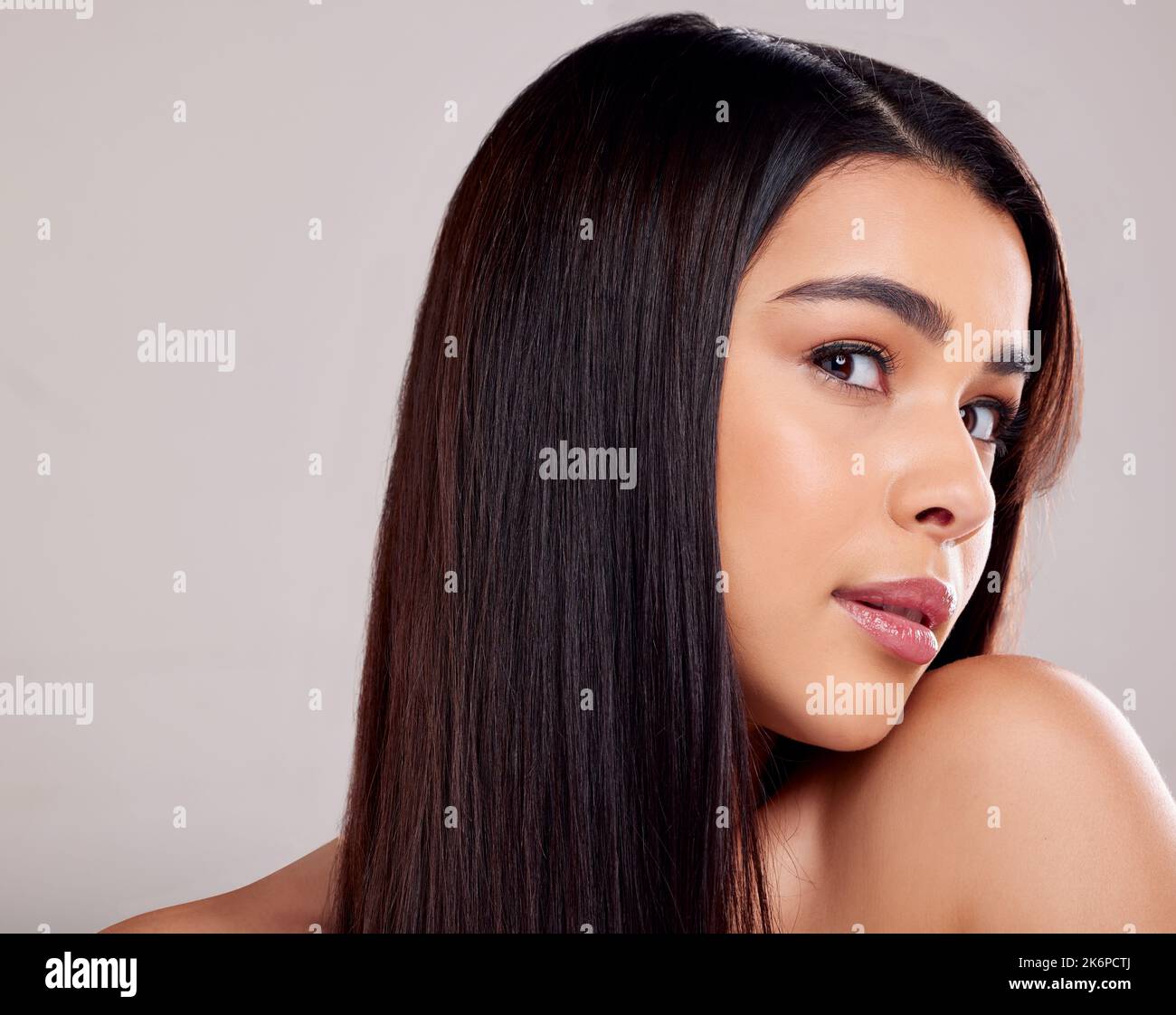 My hair makes me extra confident. Studio portrait of an attractive ...