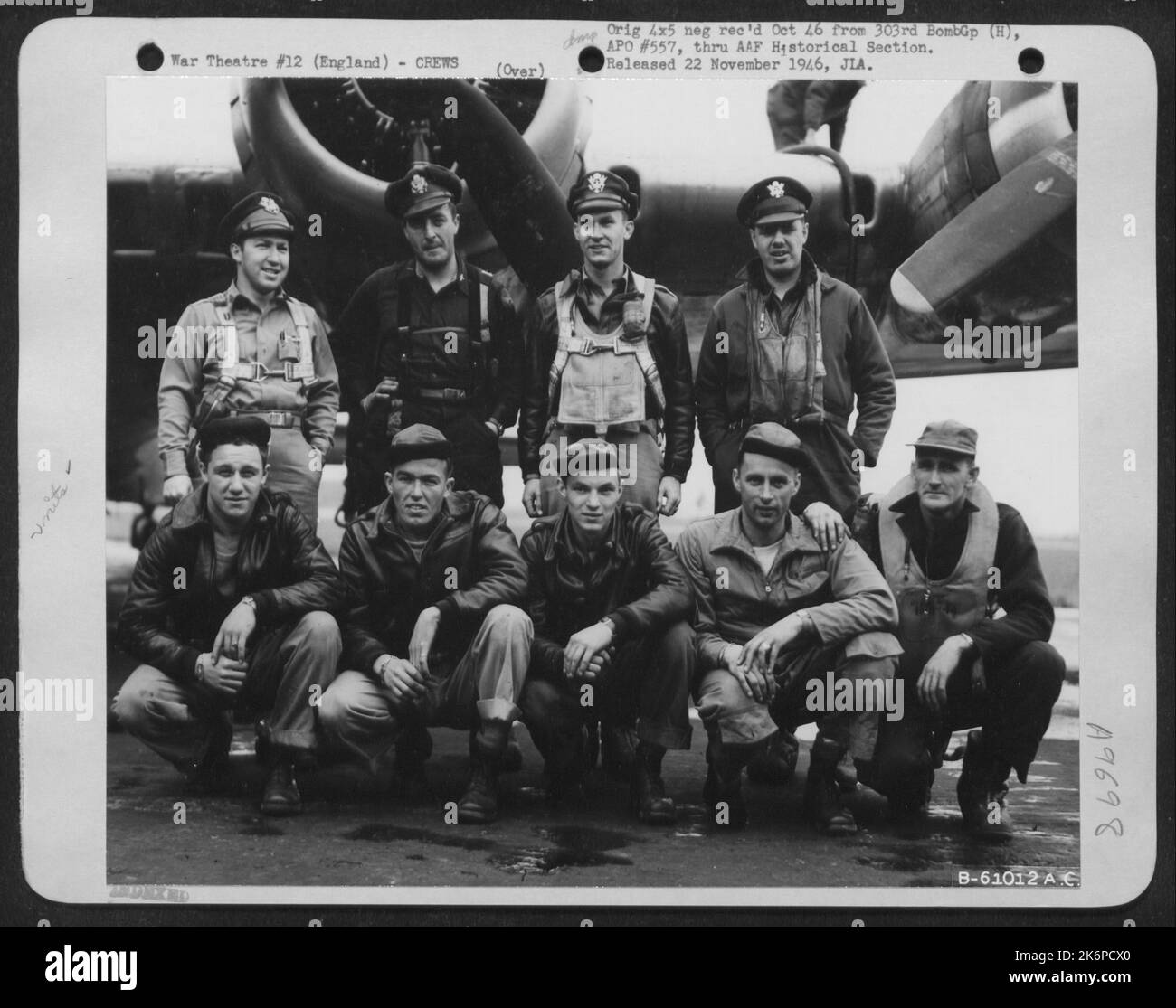 Lead Crew On Bombing Mission To Leipzig, Germany, Beside A Boeing B-17 ...