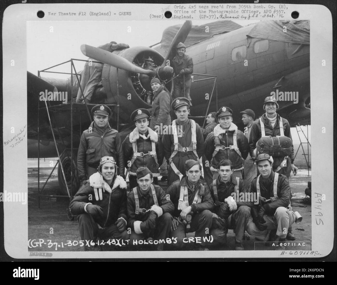 Lt. Holcomb And Crew Of The 305Th Bomb Group, Are Shown Beside A B-17 ...