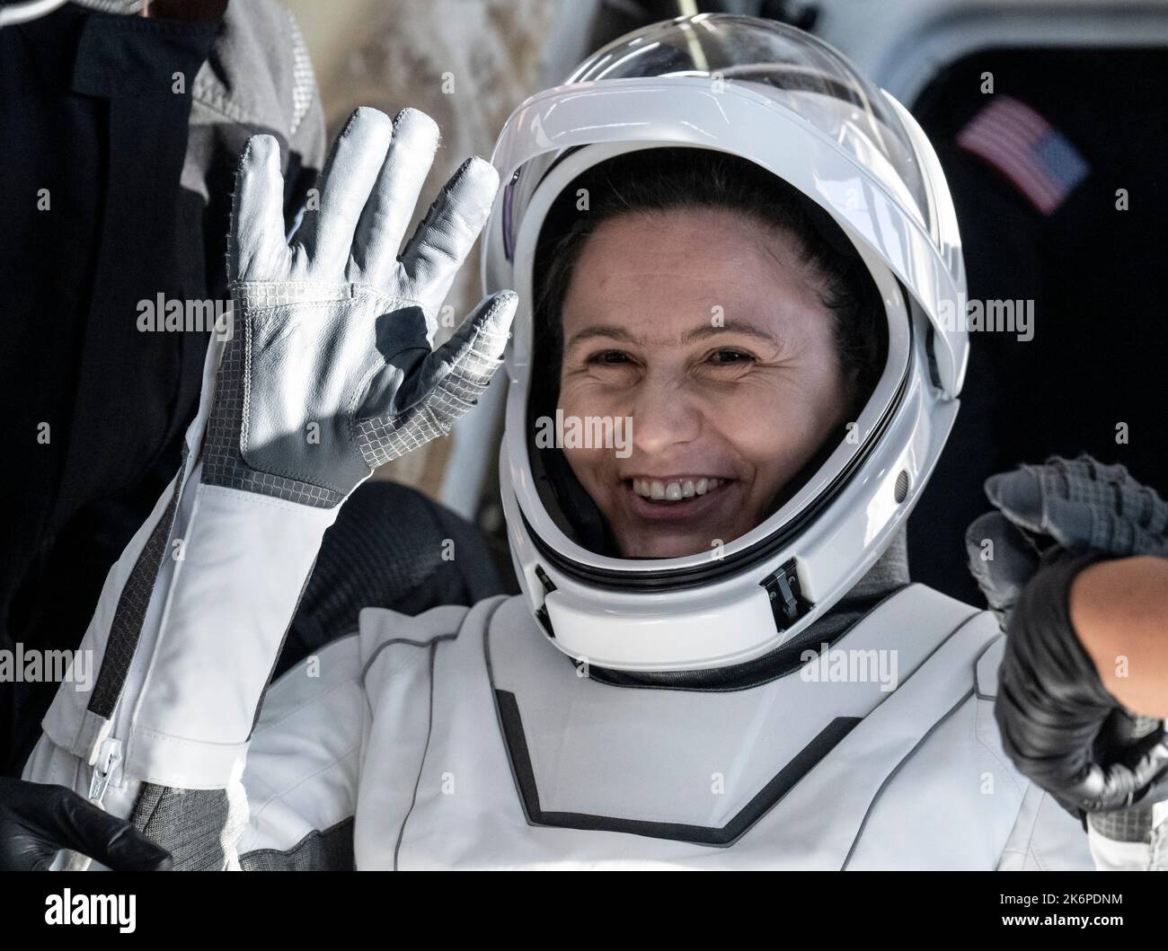ESA (European Space Agency) astronaut Samantha Cristoforetti is helped out of the SpaceX Crew ...
