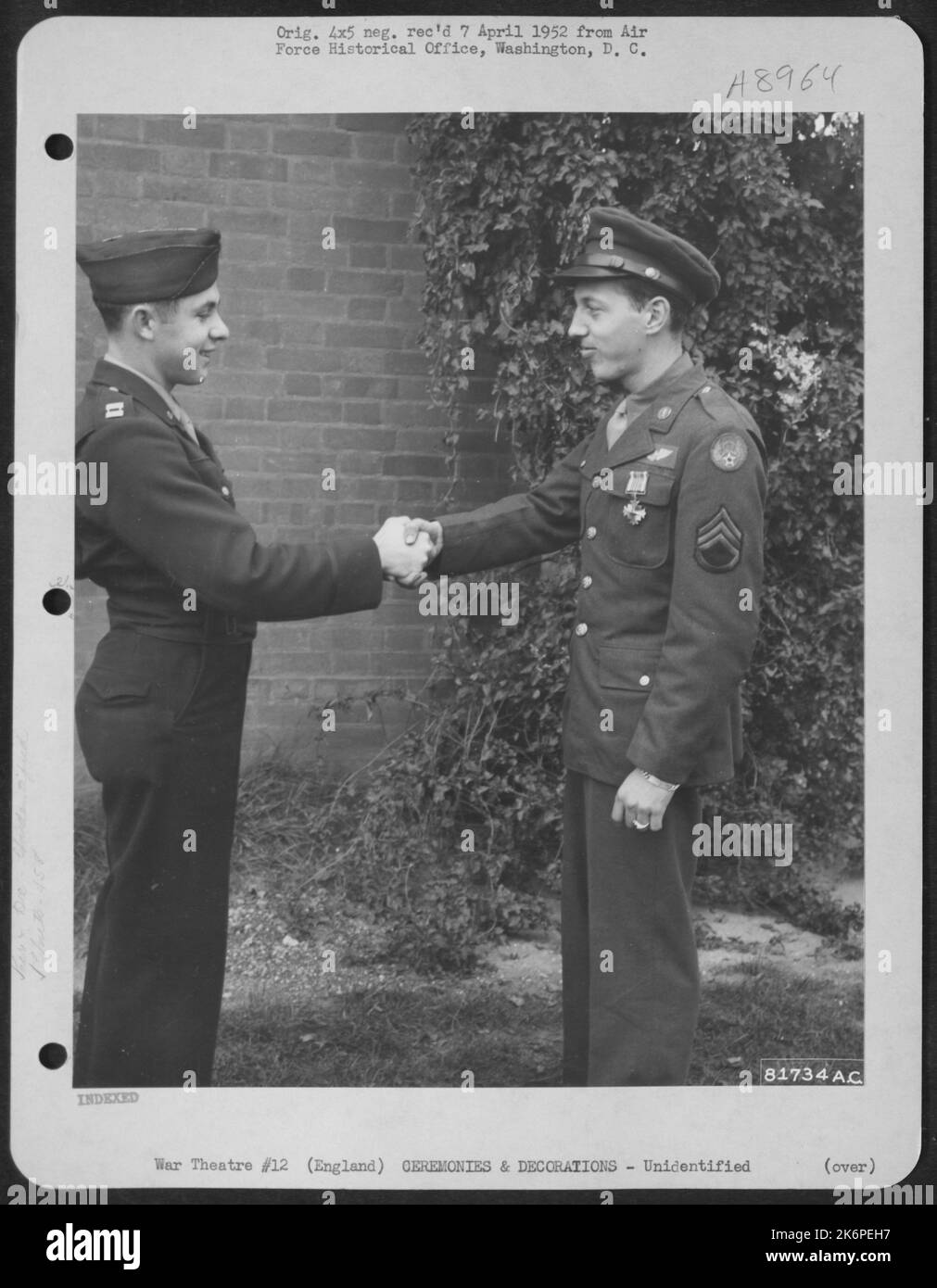 A Member Of The 458Th Bomb Group Is Congratulated After Receiving The ...