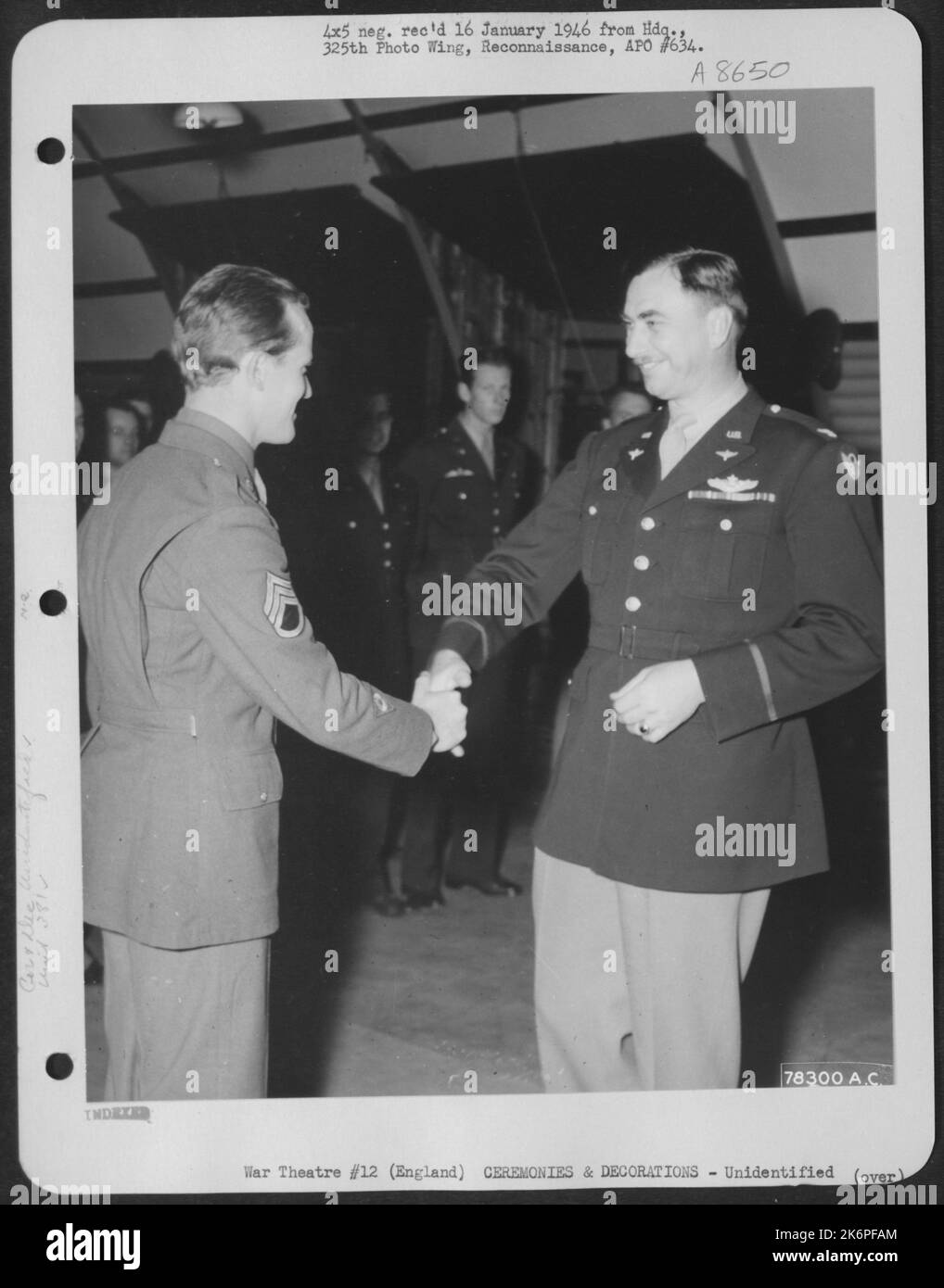 A Member Of The 381St Bomb Group Is Congratulated After Receiving An ...