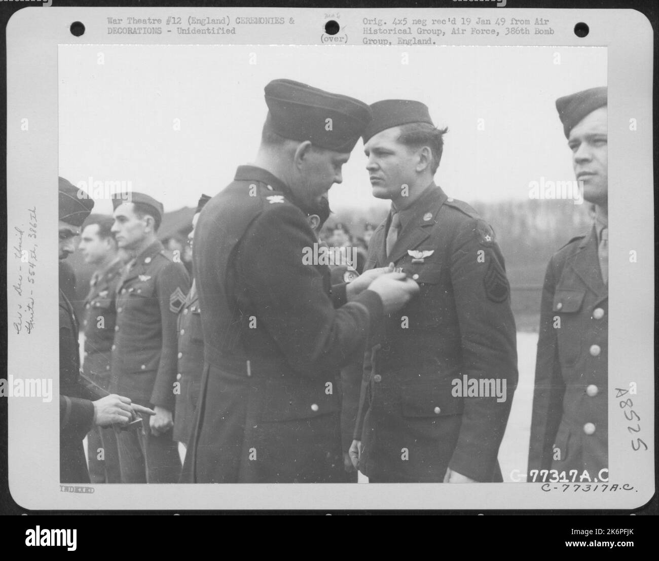 A Member Of The 554Th Bomb Squadron, 386Th Bomb Group Receives An Award ...