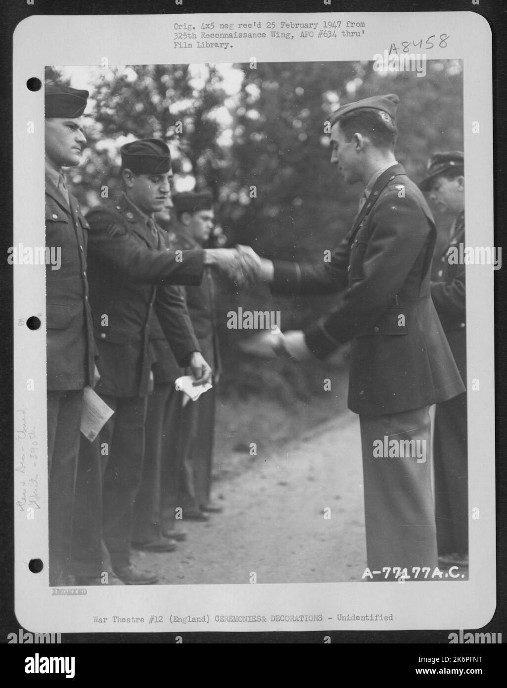 A Member Of The 390Th Bomb Group Is Congratulated After Receiving An ...
