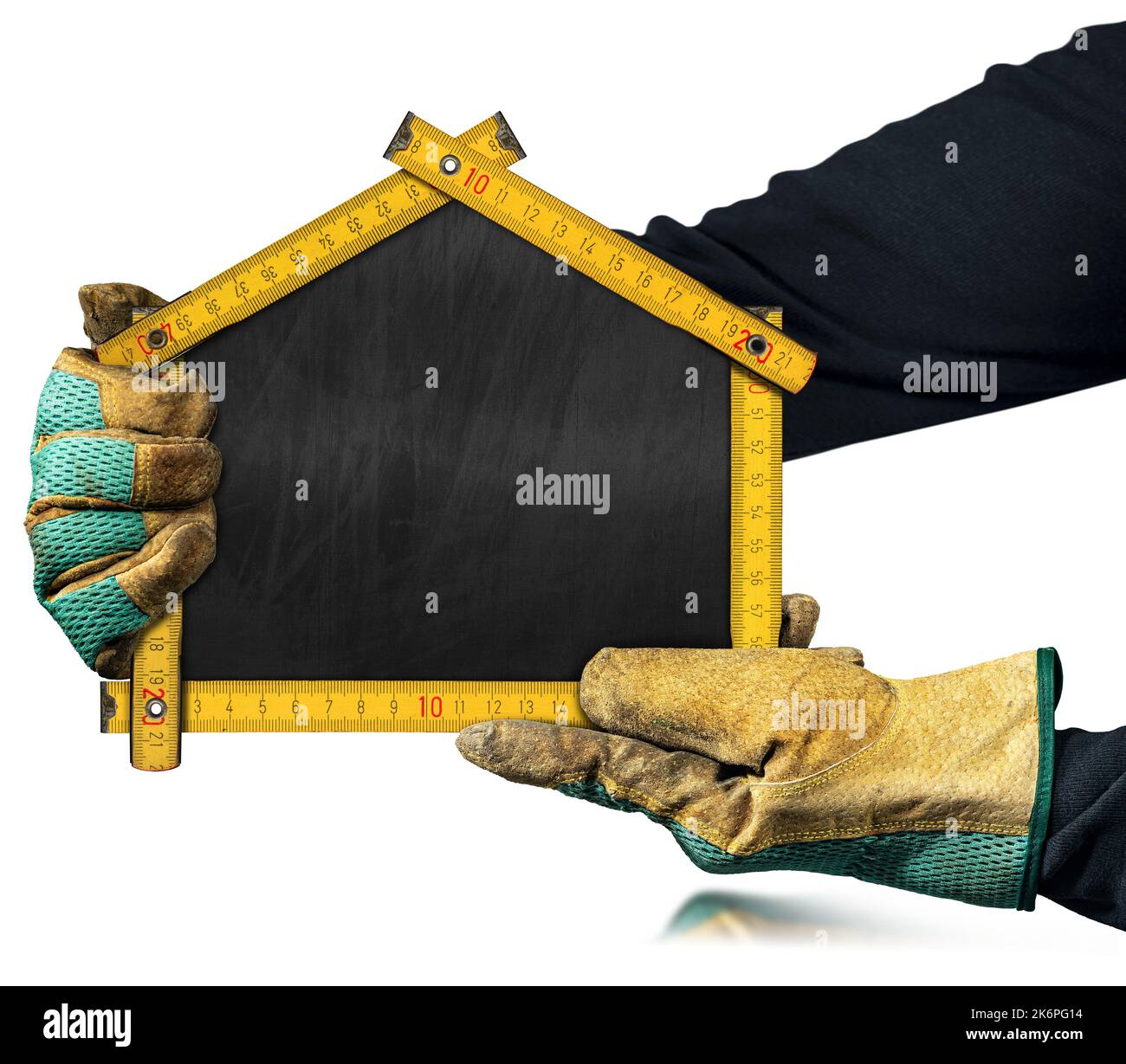 Manual worker with work gloves holding a folding ruler in the shape of ...