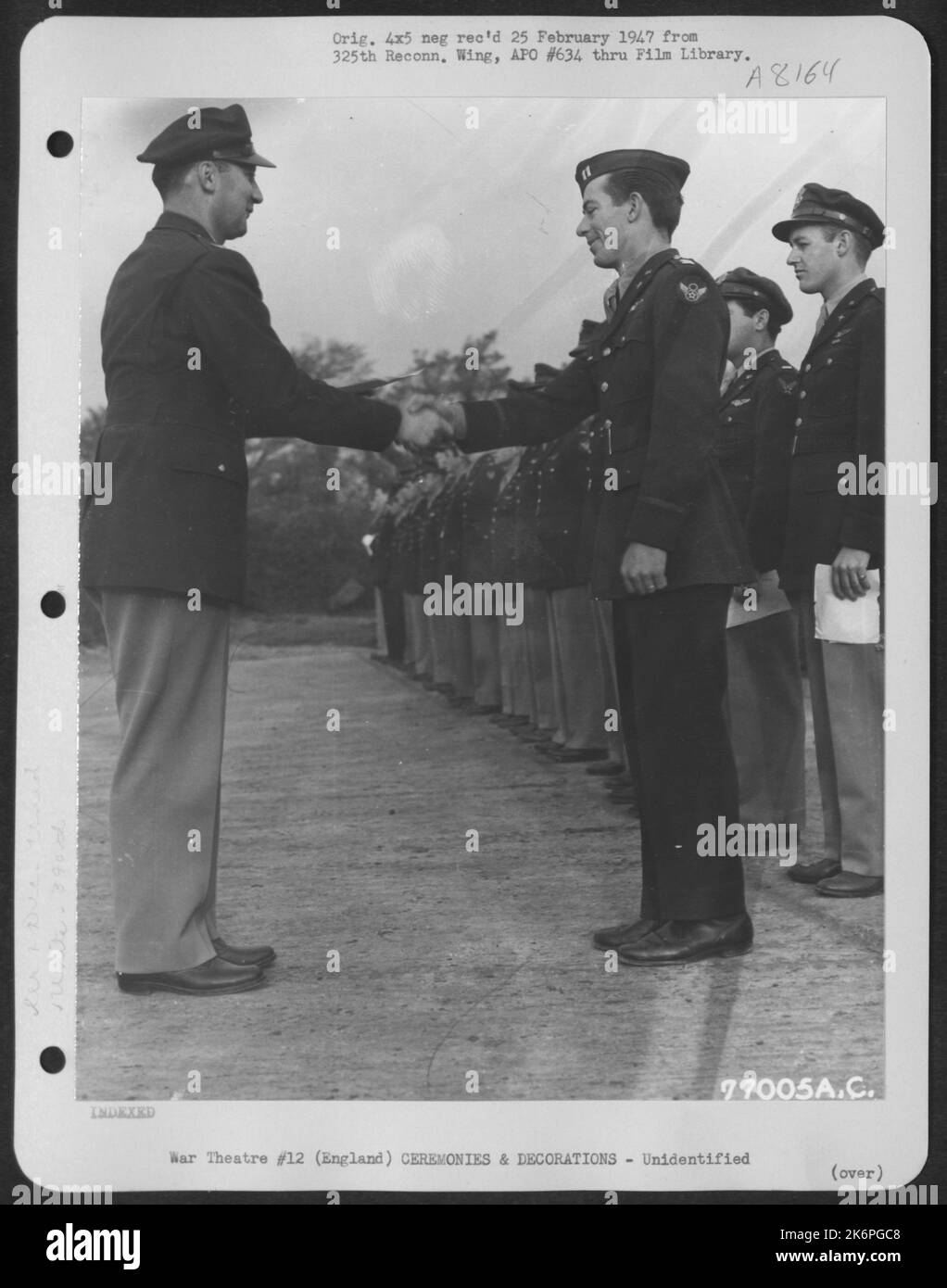 A Member Of The 390Th Bomb Group Is Congratulated After Receiving An ...