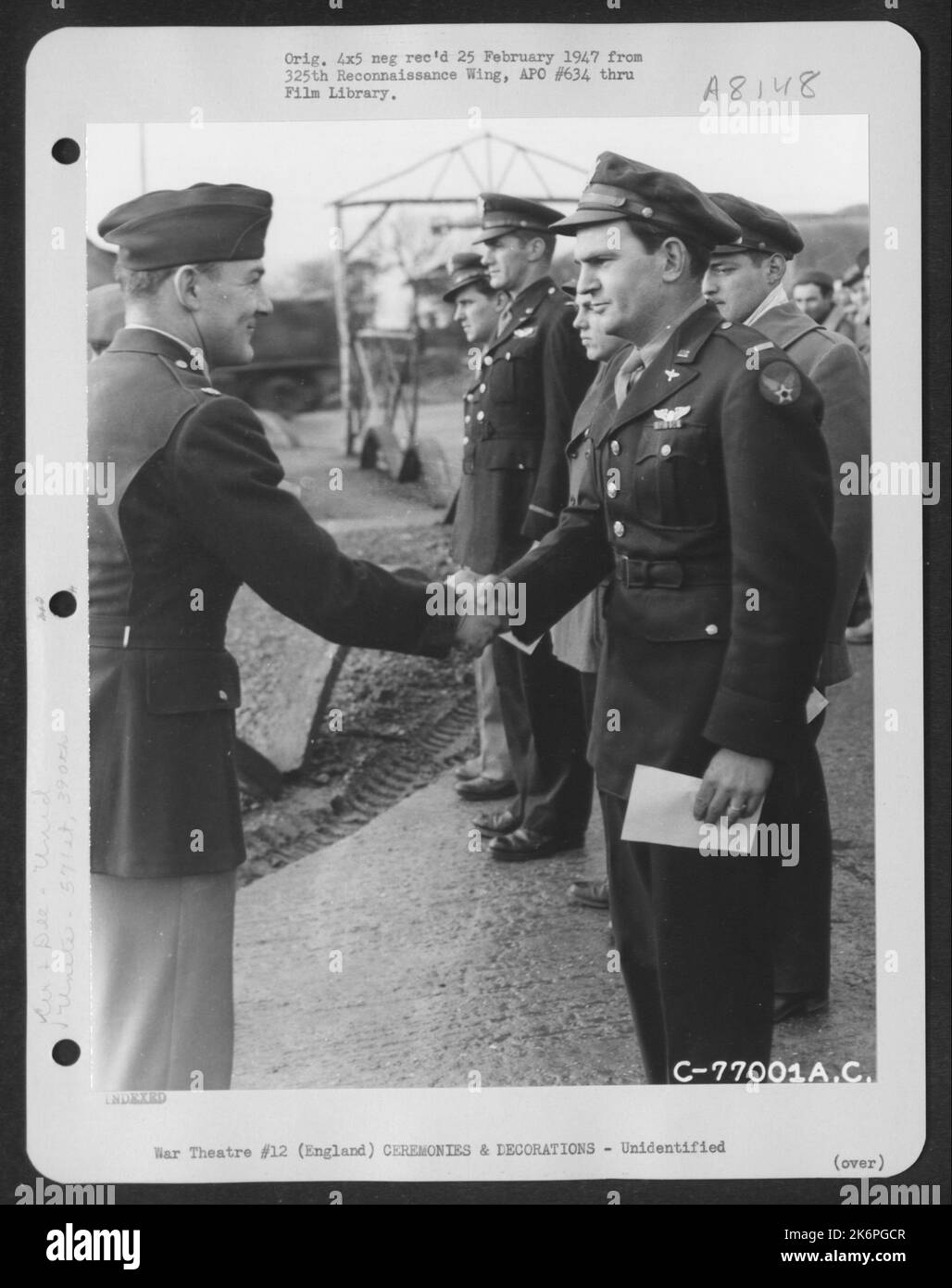 A Member Of The 571St Bomb Squadron, 390Th Bomb Group Is Congratulated ...