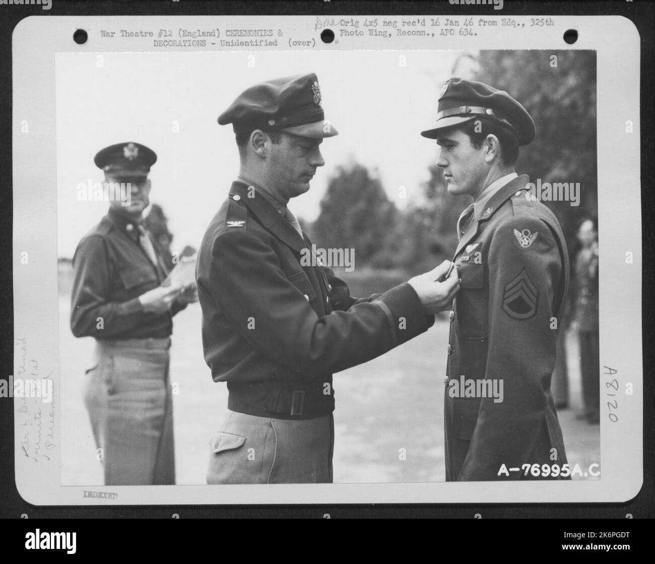 Colonel Harry P. Leber Presents An Award To A Member Of The 381St Bomb ...