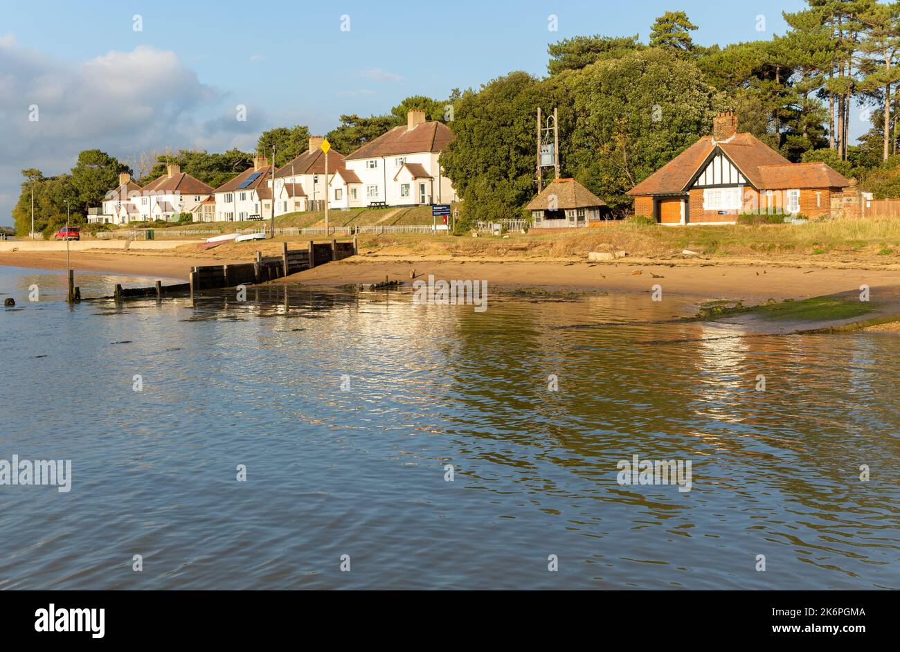 Sandy beach and shoreline of tidal River Deben, Bawdsey Quay, Suffolk ...