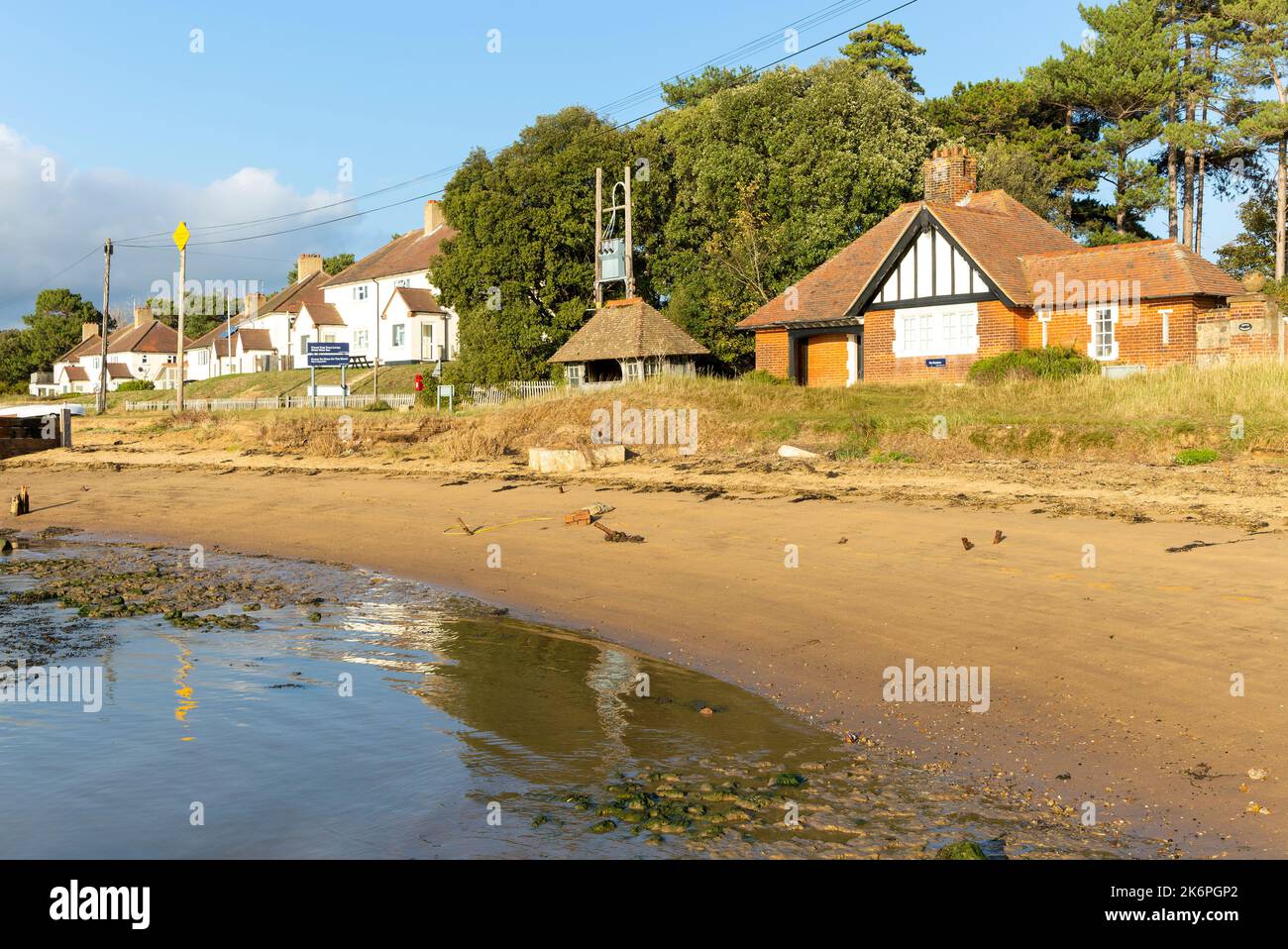 Sandy beach and shoreline of tidal River Deben, Bawdsey Quay, Suffolk ...