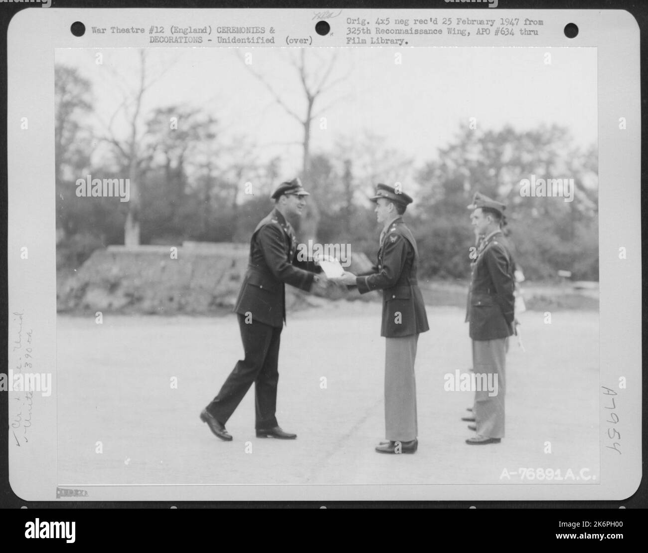A Member Of The 390Th Bomb Group Is Congratulated After Receiving An ...