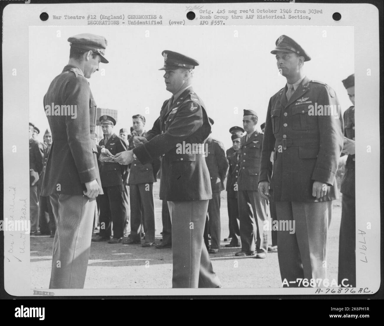 A Member Of The 303Rd Bomb Group Receives An Award At An Air Base ...
