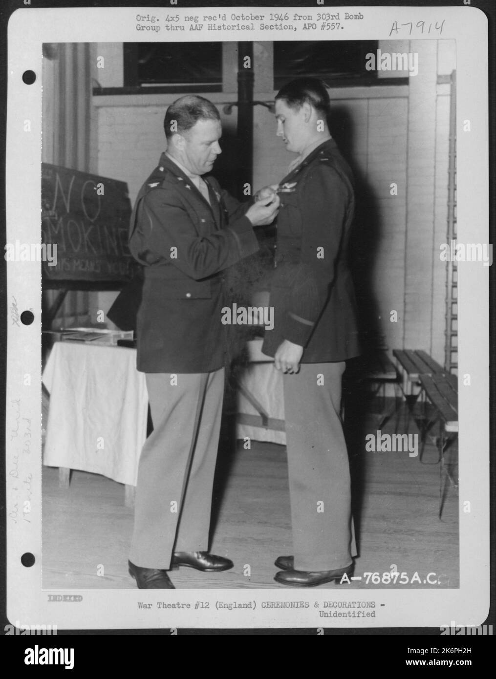 A Member Of The 303Rd Bomb Group Receives An Award At An Air Base ...