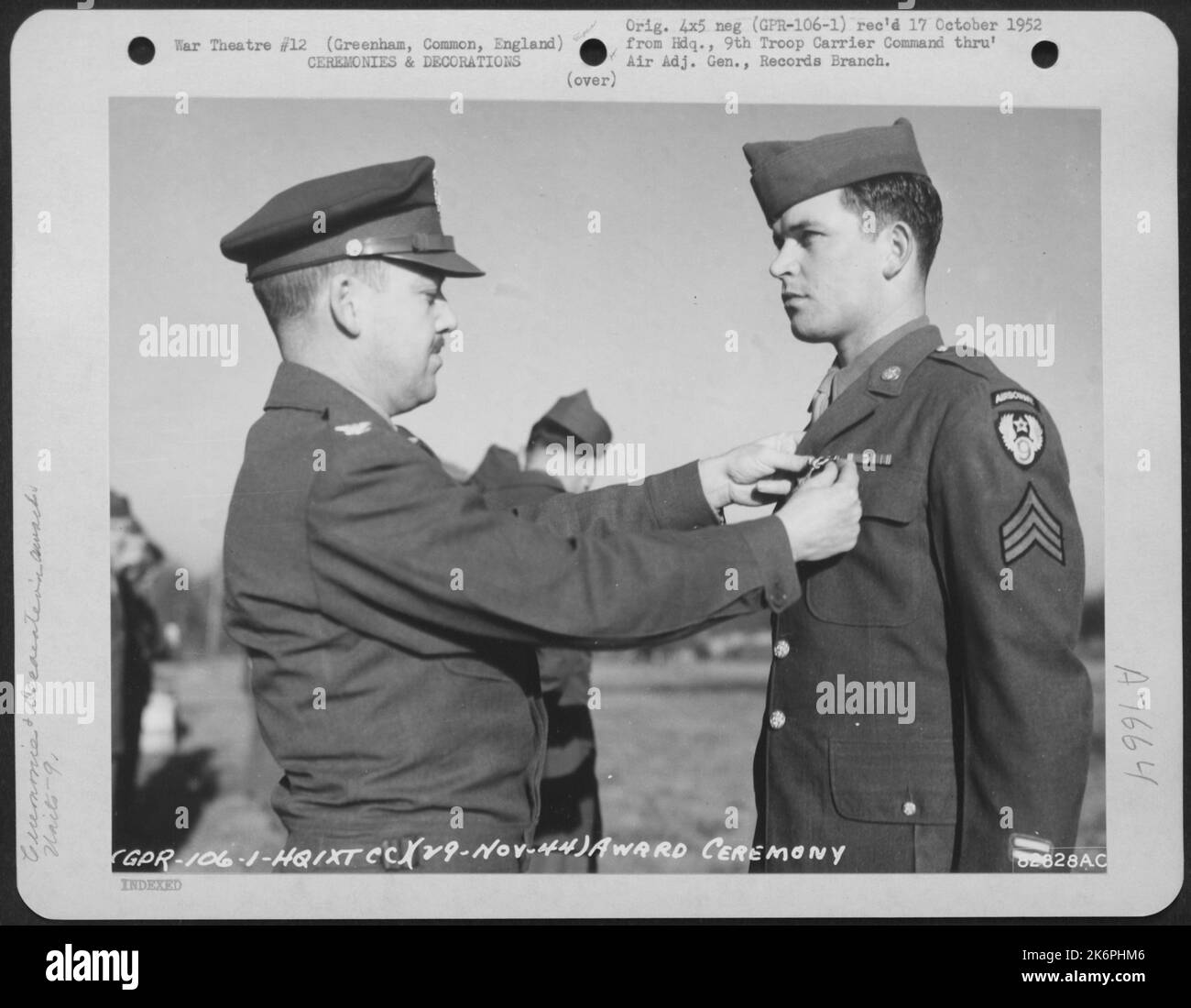 During An Award Ceremony, A Member Of The 9Th Troop Carrier Command Is ...