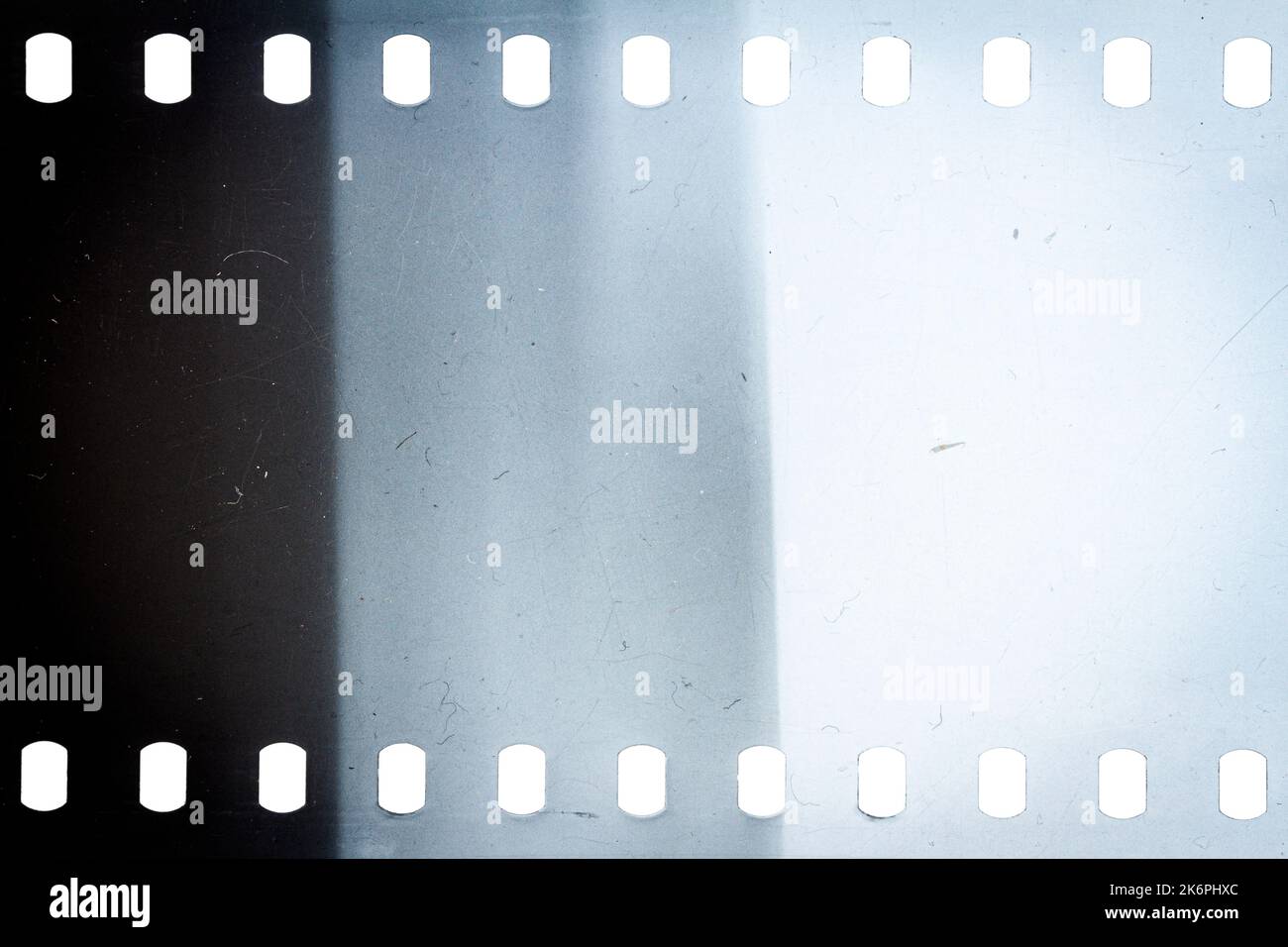 Dusty and grungy 35mm film texture or surface. Perforated scratched ...