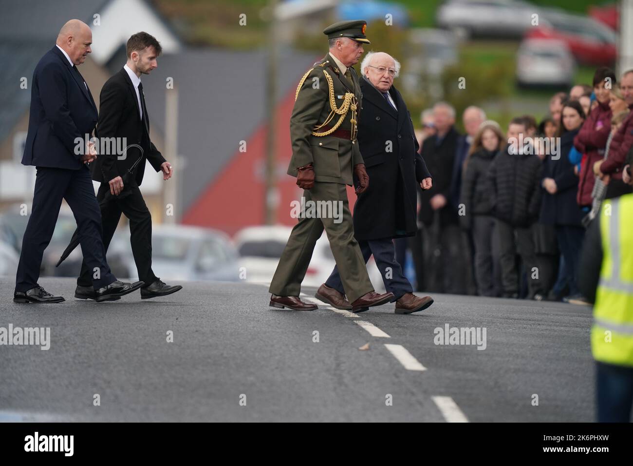President Michael D Higgins (right) leaves St Michael's Church, in ...
