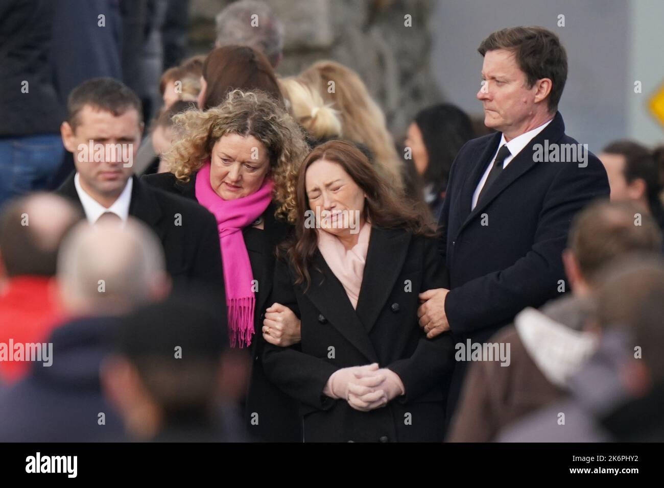 Robert Garwe's partner Aine (centre) leaves St Michael's Church, in ...