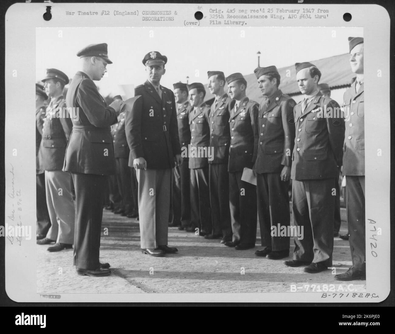 Members Of The 390Th Bomb Group, Standing In Formation, Await ...