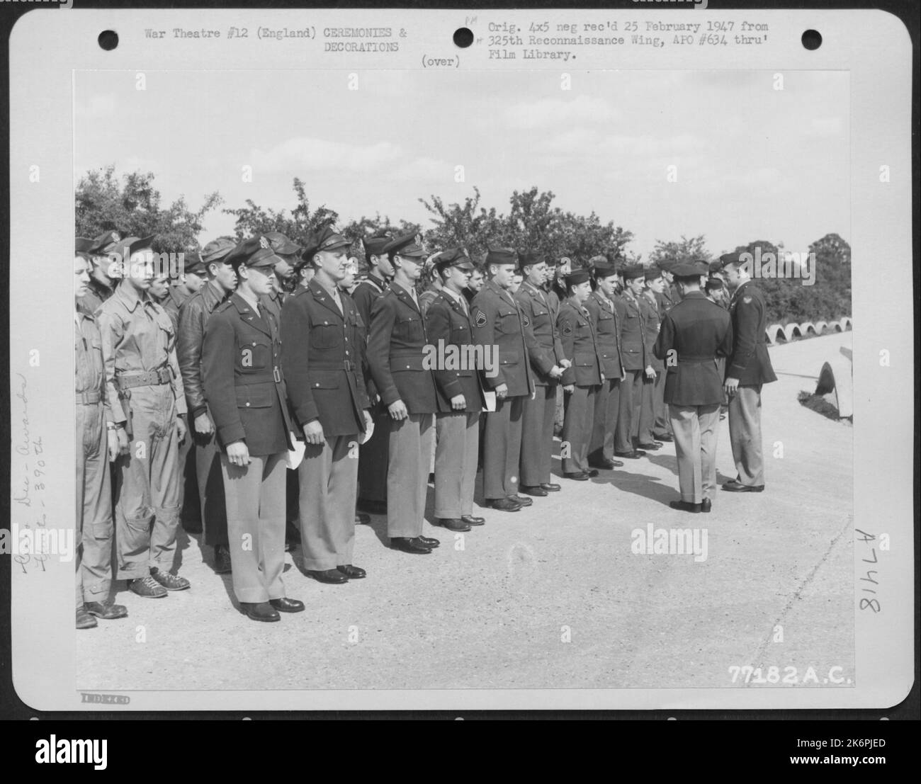 Members Of The 390Th Bomb Group, Standing In Formation, Await ...