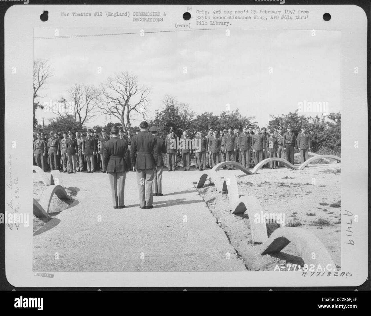 Members Of The 390Th Bomb Group, Standing In Formation, Await ...