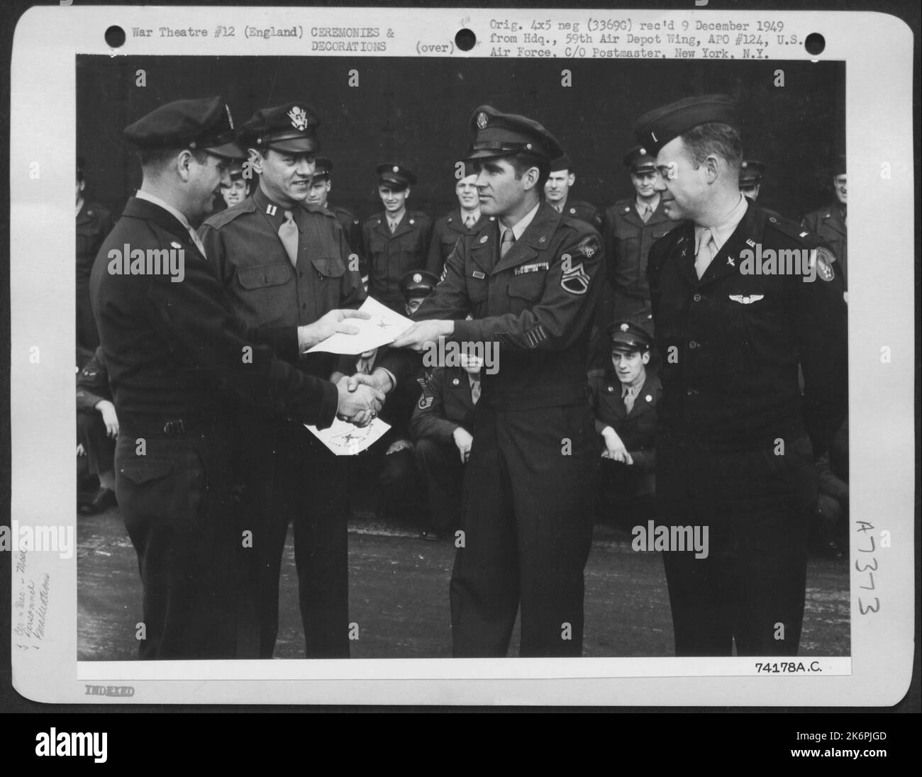 As Capt. Fret And Lt. Kollew Look On, Major Keating Presents A Diploma ...
