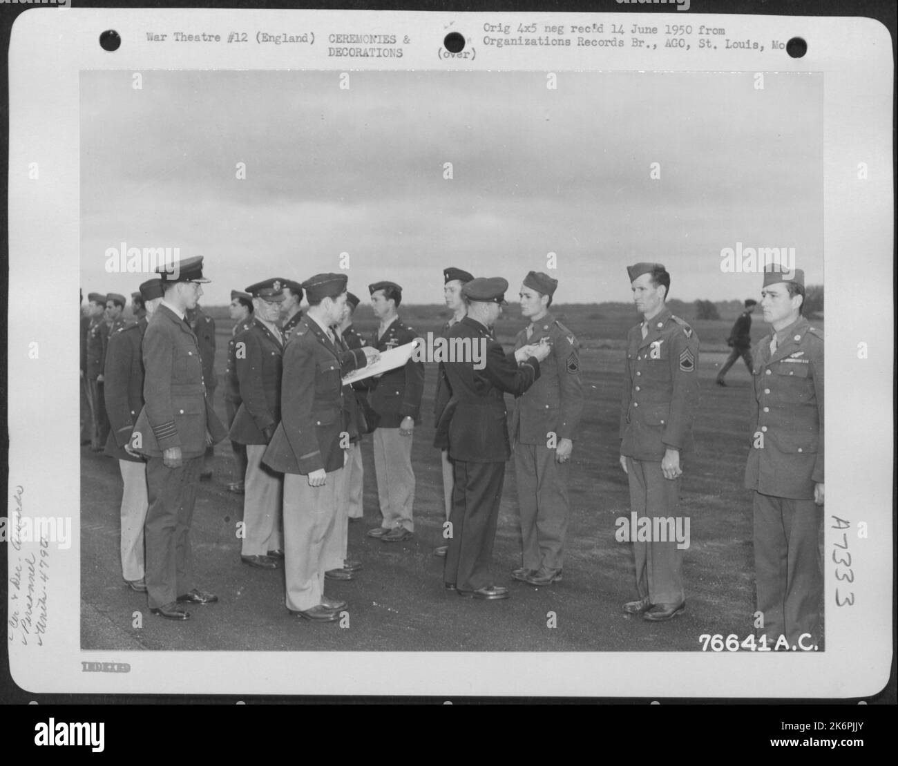 Major General Ira C. Eaker Presents An Award To An Enlisted Man Of The ...