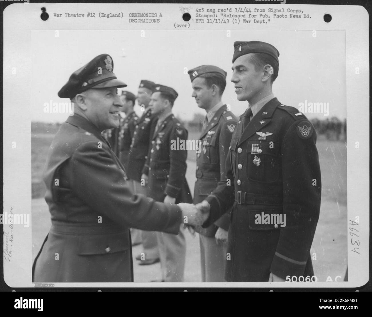 ESSEX, ENGLAND-Brig. General Robert C. Candee congratulates 1st Lt ...