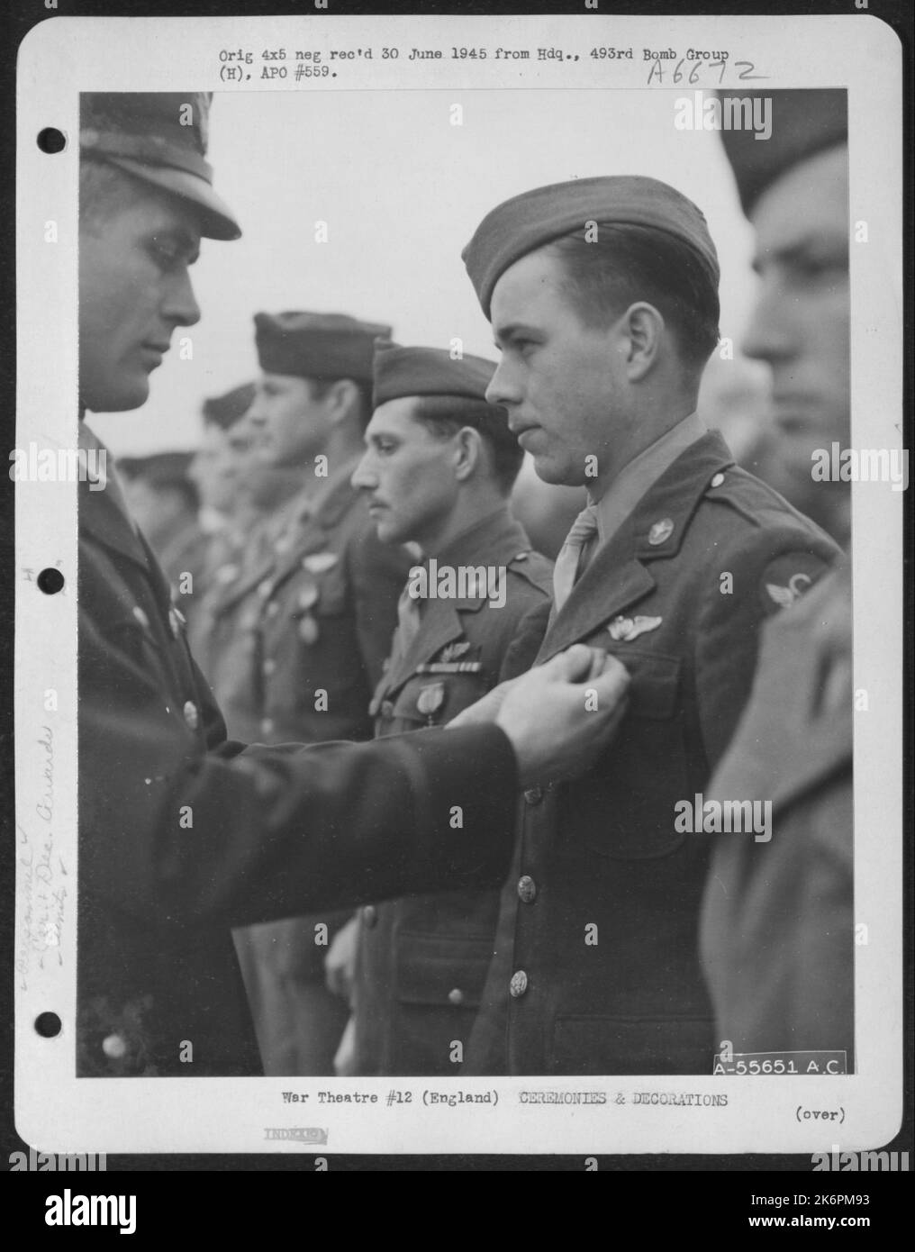 Presentation of medal to F.L. Crecelius (enlisted man) of the 493rd ...