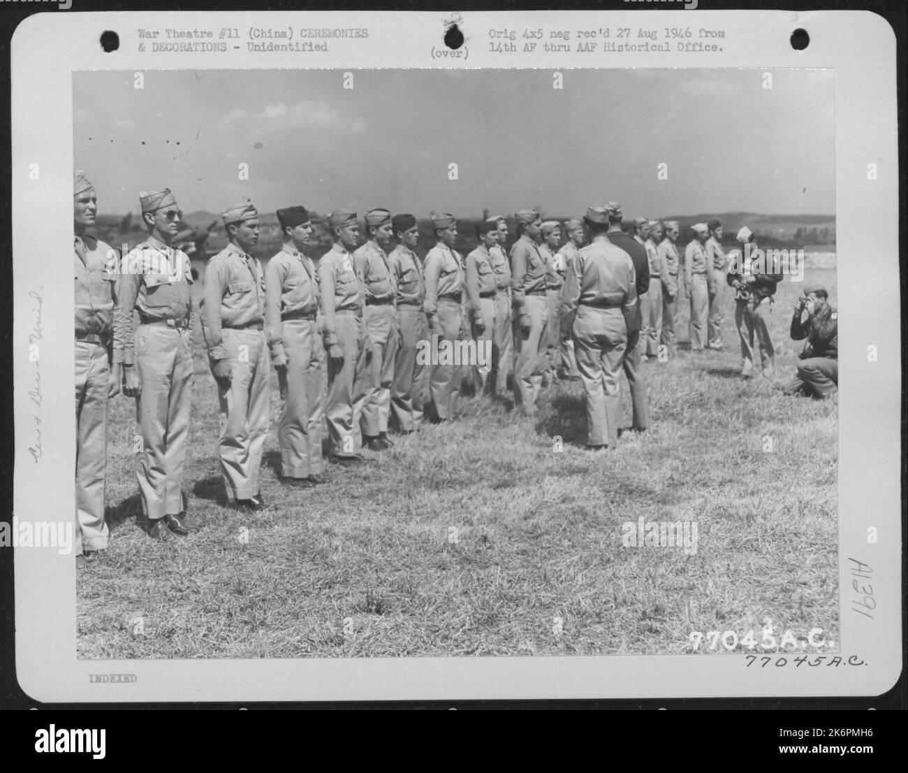 Members Of The 14Th Air Force Stand In Formation In Front Of A Line Of ...