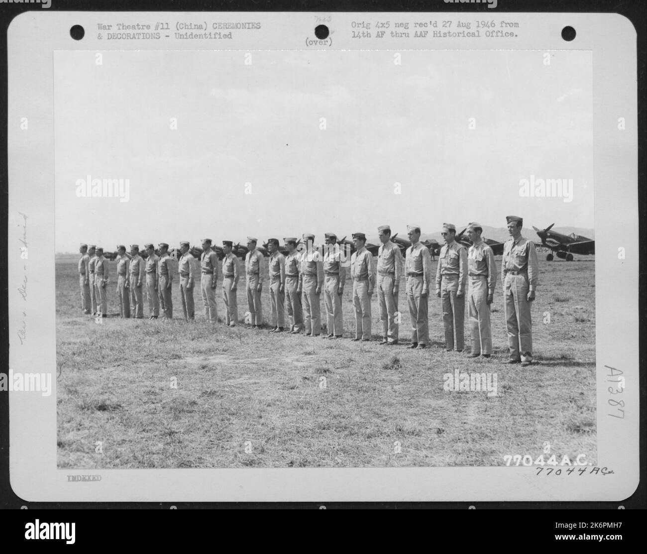 Members Of The 14Th Air Force Stand In Formation In Front Of A Line Of ...