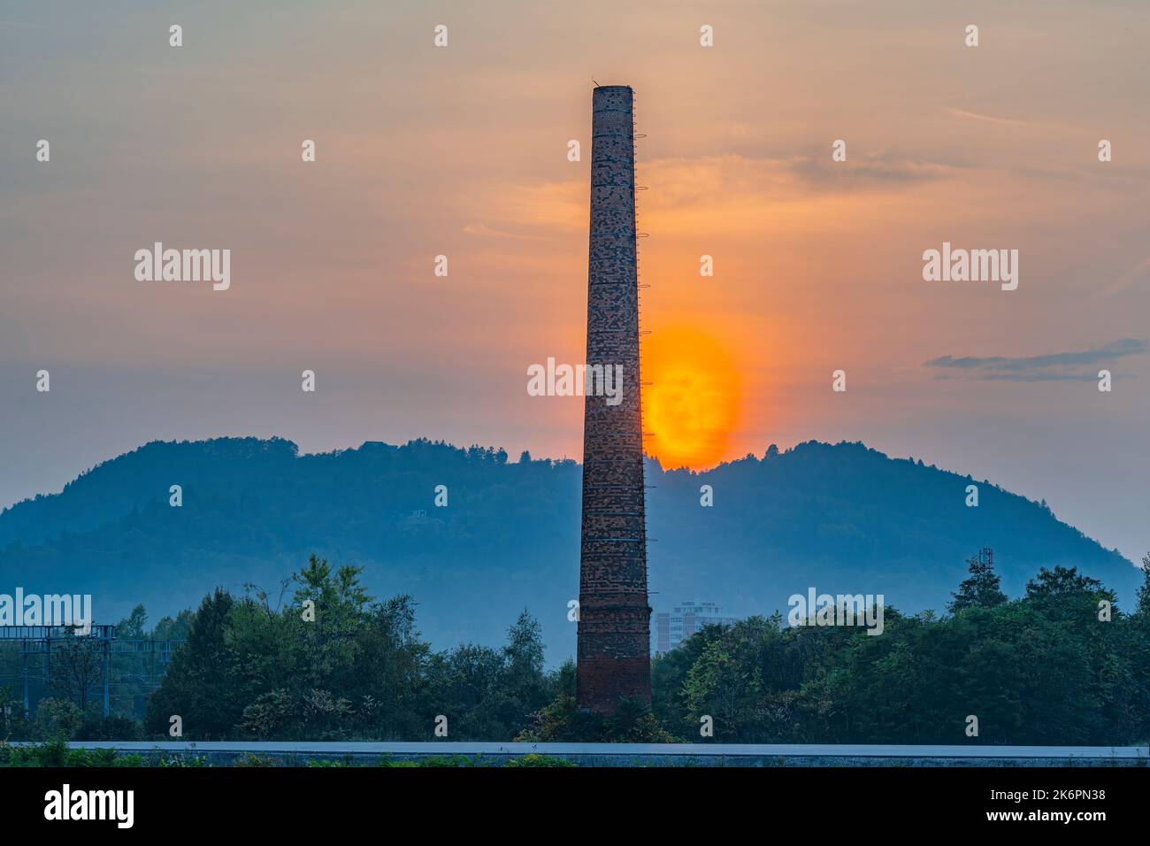 Old chimneys at a sunset Stock Photo - Alamy