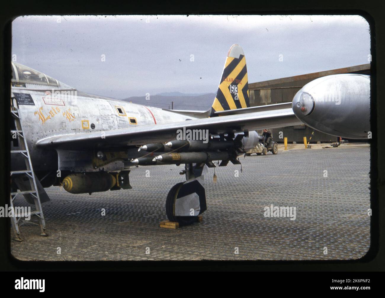 One-quarter left front view of a Republic F-84E Thunderjet 'Lois K' (s ...