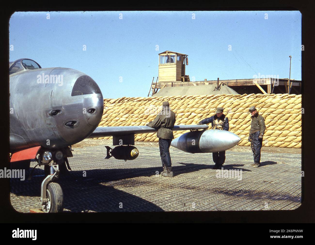 One-half right front view of the nose and left wing of a Lockheed F-80 ...