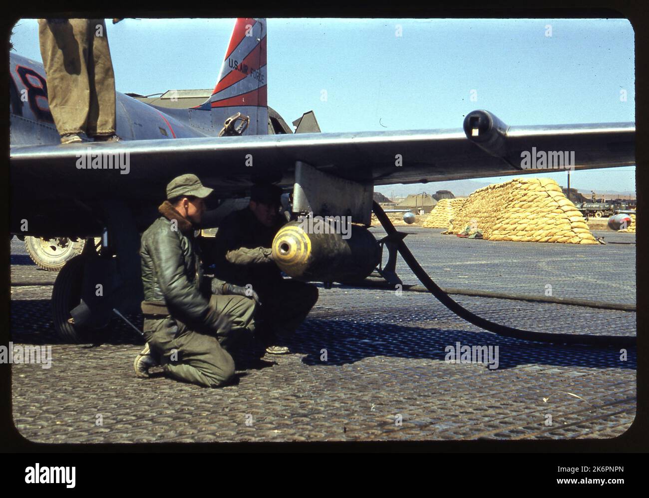 One-quarter left front view of the left wing and tail of a Lockheed F ...