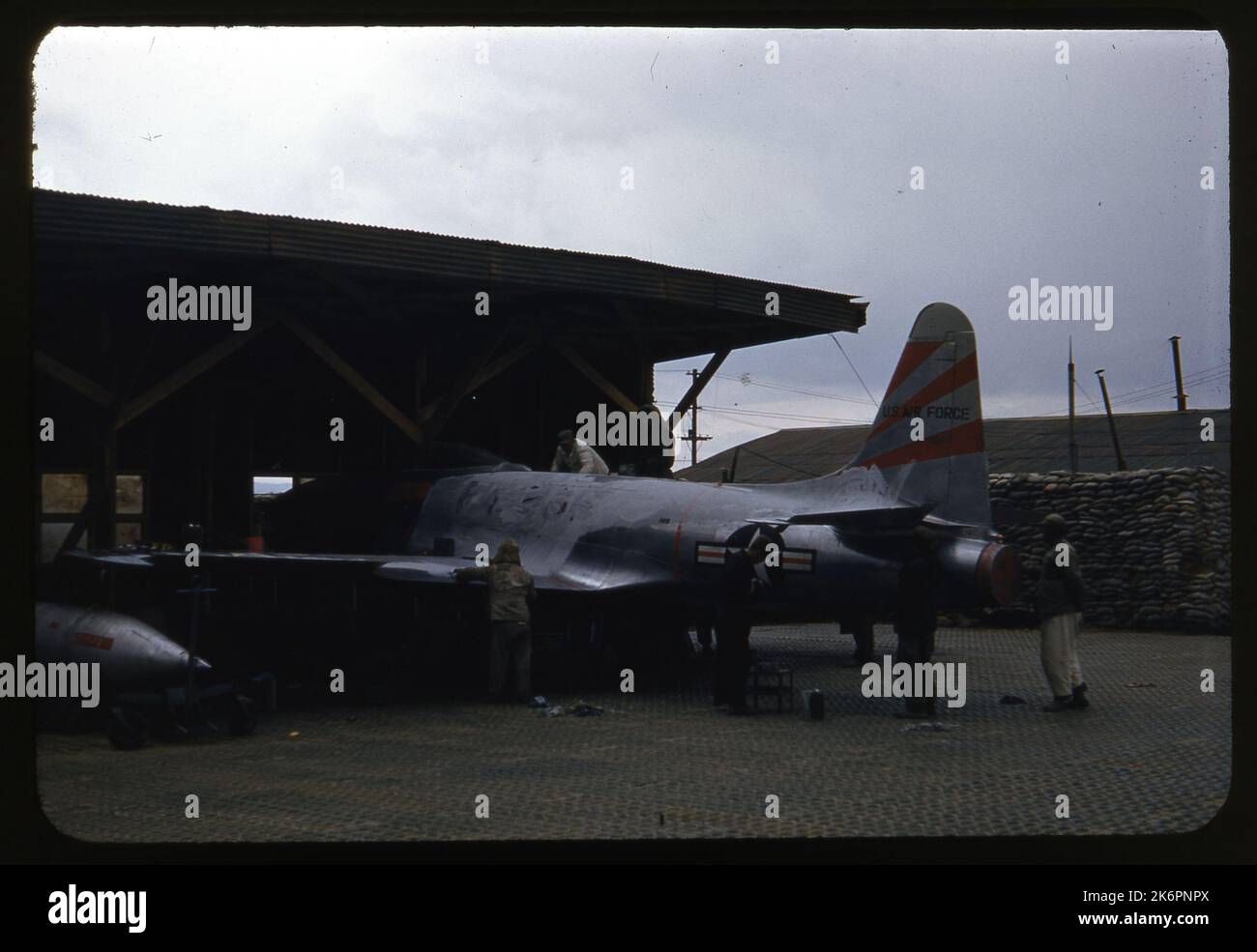 One-half left side view of a Lockheed F-80 Shooting Star parked in a ...