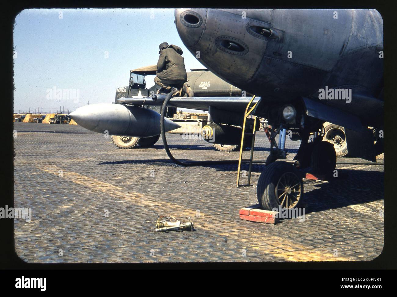 One half left underside view of the nose and right wing of a Lockheed F ...