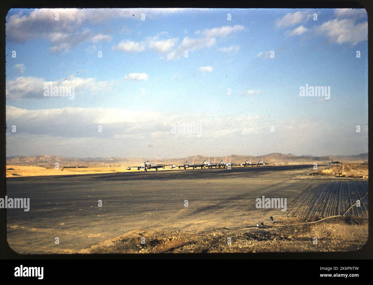 One-half left front view of eight Lockheed F-80 Shooting Stars taxiing ...
