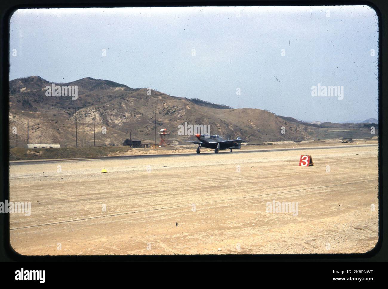 One-quarter left front view of a North American Mustang Mk. IV taxiing ...